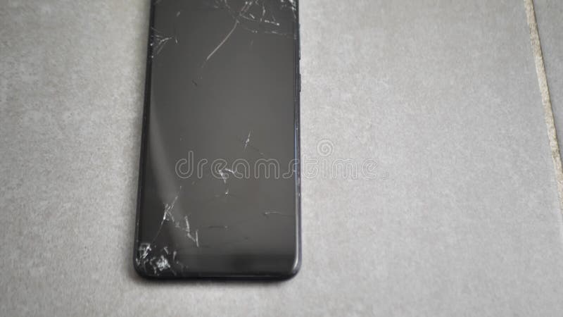 Broken Phone Screen Lying on the Floor Stock Footage - Video of holding ...