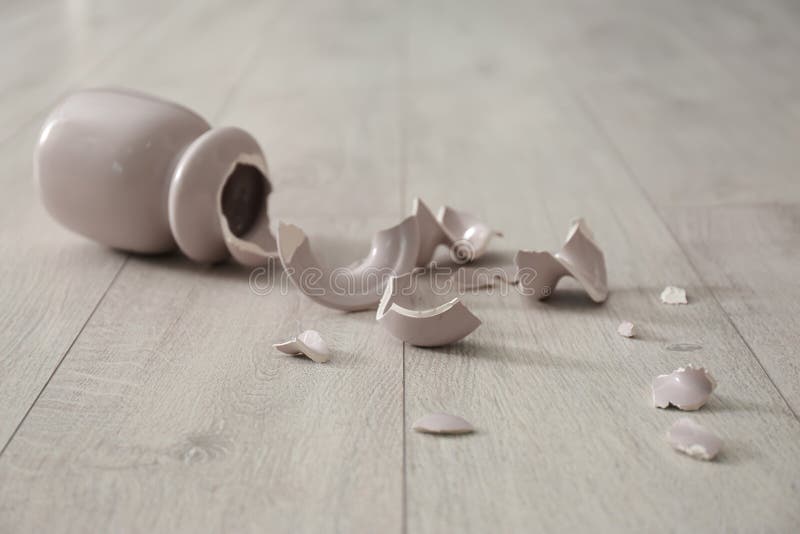 Broken Pink Ceramic Vase on Wooden Floor Stock Image - Image of ceramic ...