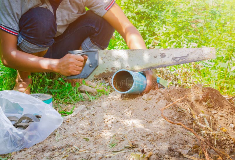 Broken Pipe in Hole and Water Motion at Roadside Plumber Working Repair ...