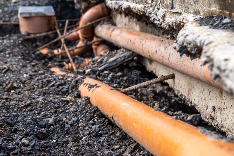 Broken Pipes Due To Subsidence in the Soil Around the House Stock Image ...