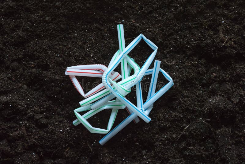 Colored Plastic Drinking Straws on a Black Table Stock Photo - Image of ...