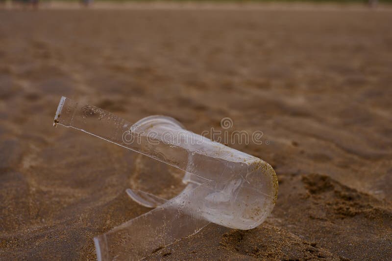Broken Plastic Cup on the Nice Sandy Beach Stock Photo - Image of ...