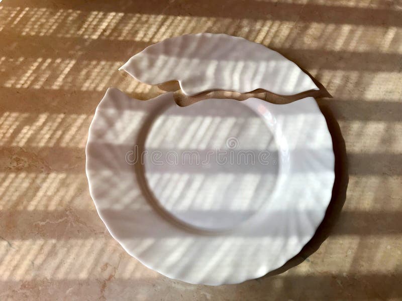 Broken Plate on the Table, on the Floor. Stock Photo - Image of white ...