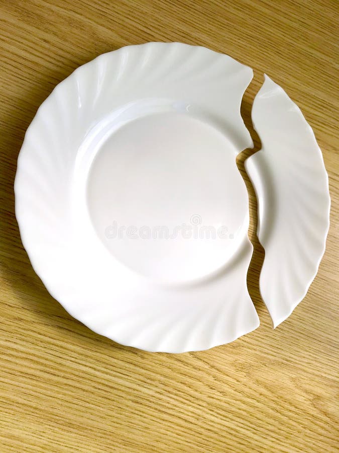 Broken Plate on the Table, on the Floor. Stock Photo - Image of ...