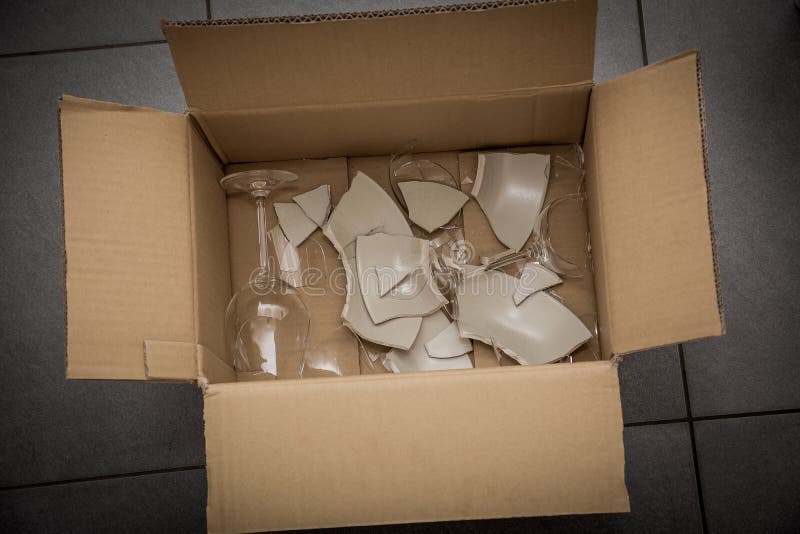 Broken Plates or Broken Glass Put in Box in the Kitchen. the Concept of ...