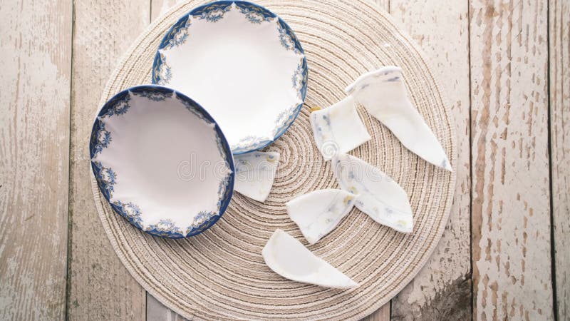 Broken Plates on Table Close Up Stock Video - Video of blank, broken ...