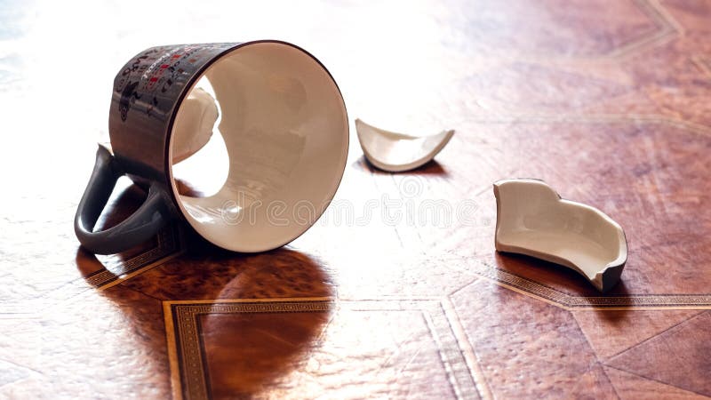Broken Porcelain Mug on the Kitchen Floor Stock Image - Image of halved ...