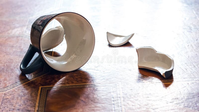 Broken Porcelain Mug on the Kitchen Floor Stock Image - Image of ...