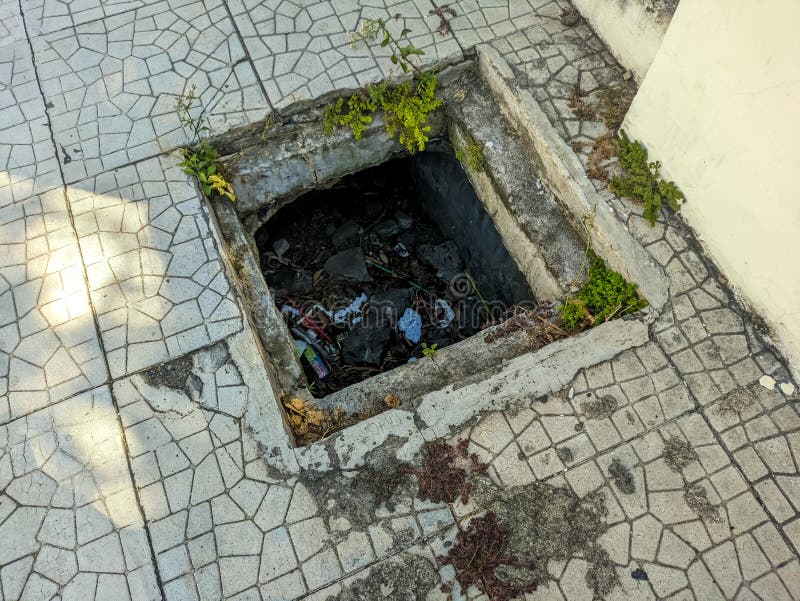 A Broken and Pothole Pavement Stock Image - Image of concrete, cracked ...