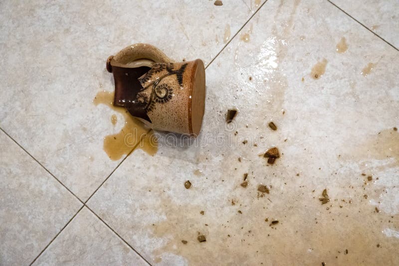 Coffee Mug Broken and Shattered on the Floor Stock Photo - Image of ...