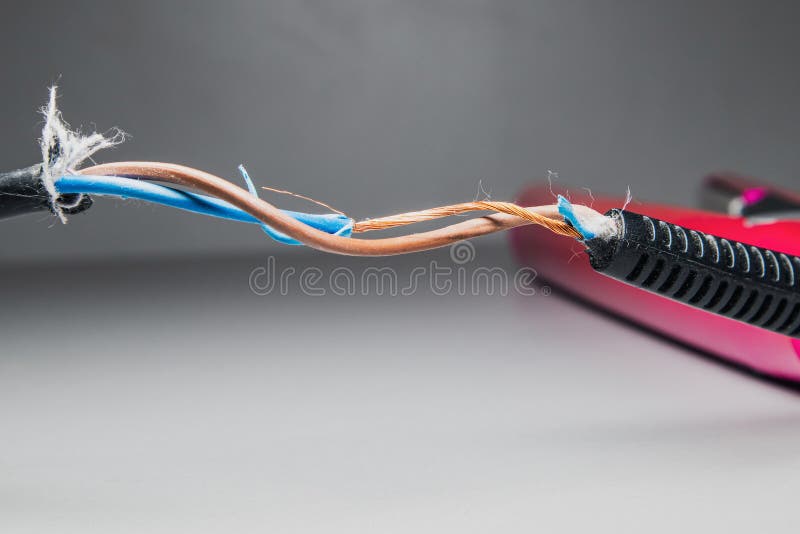 Broken Power Cord for Home Electrical Appliances. Soft Focus Stock ...