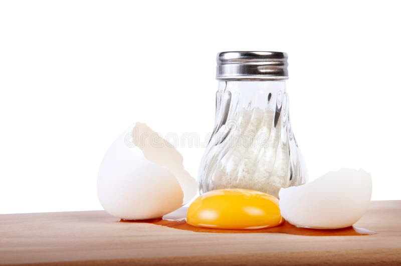 Broken Raw Egg with Salt Shaker Stock Photo - Image of broken, bakery ...