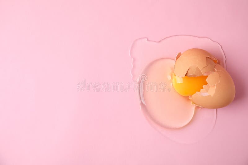 Broken Raw Egg Shell Pink Background Top View Space Text Stock Photos ...