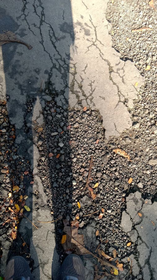 Broken Road and Human Shadow Stock Image - Image of broken, shadow ...