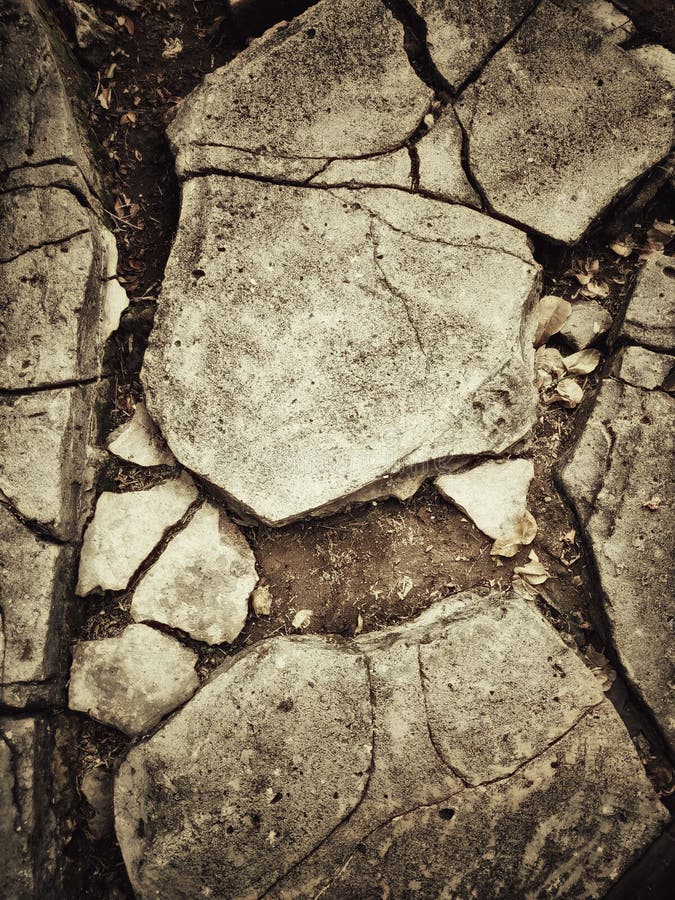 Broken rock on the pathway stock image. Image of texture - 198632085