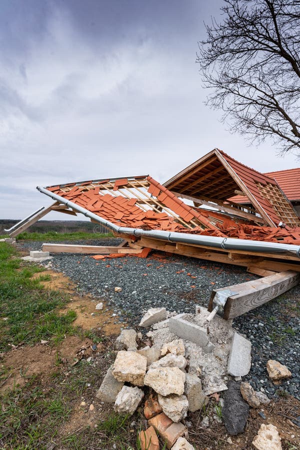 Broken roof after a storm stock image. Image of house - 185735735