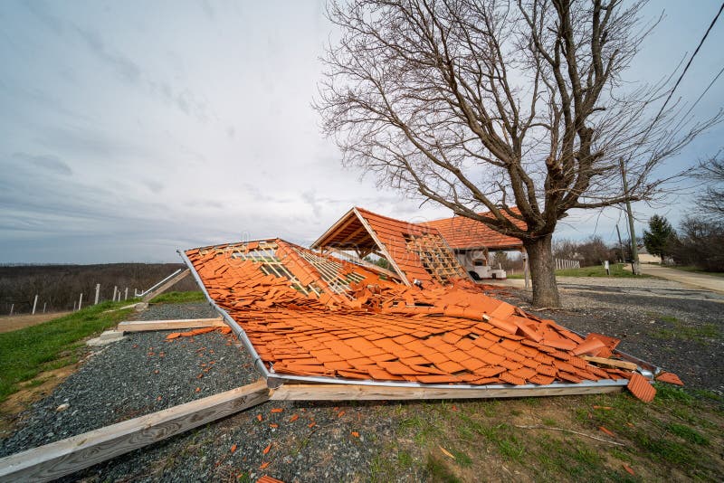 Broken roof after a storm stock image. Image of buildings - 244083833
