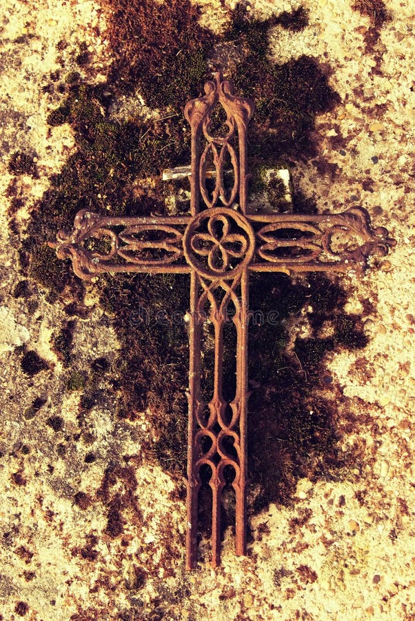 Broken and Rusty Iron Rustic Crucifix on Old Mossy Tombstone. Abandoned ...