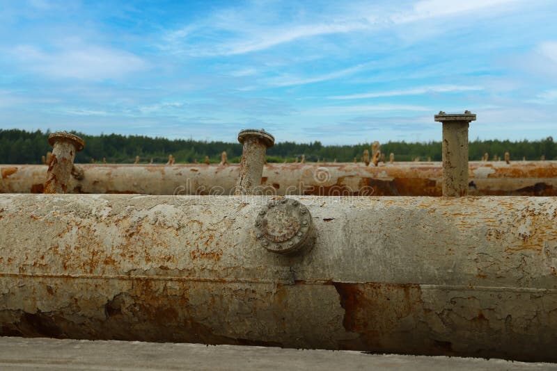 Broken, Rusty Production Pipes for Cooling Water Stock Image - Image of ...