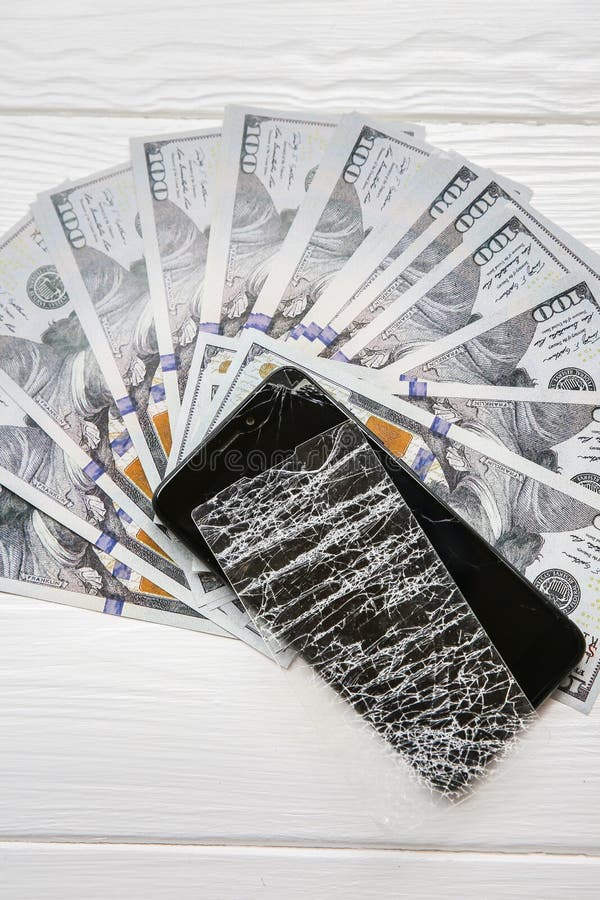 Broken Screen Protector Tempered Glass. Money Lying Near the Phone ...