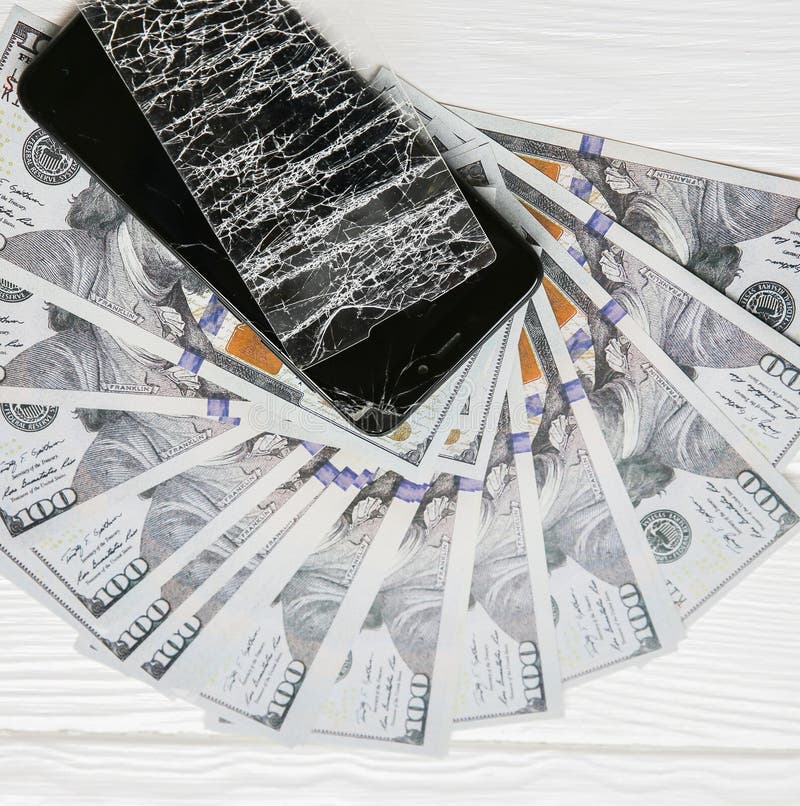 Broken Screen Protector Tempered Glass. Money Lying Near the Phone ...