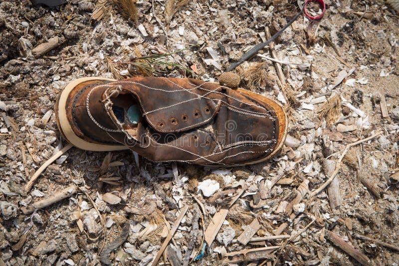 Broken Shoe Lying on the Beach Stock Photo - Image of lonely, broken ...