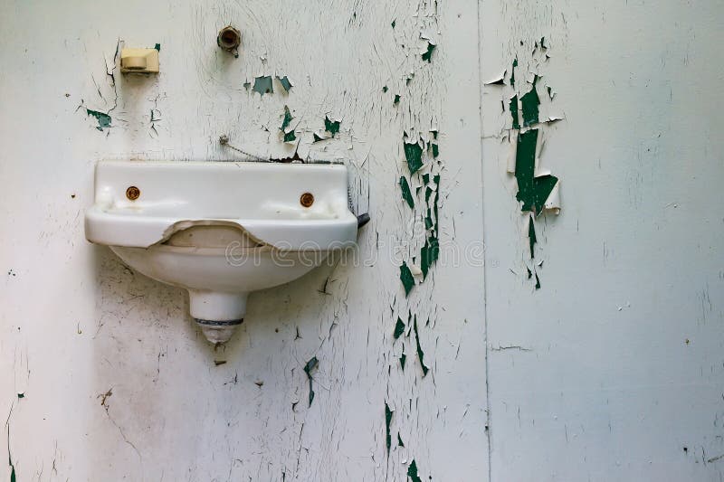 Broken Sink Against a Wall with Peeling Paint Stock Image - Image of ...