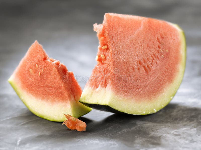 Broken Watermelon Over Orange Background Stock Photo - Image of ...