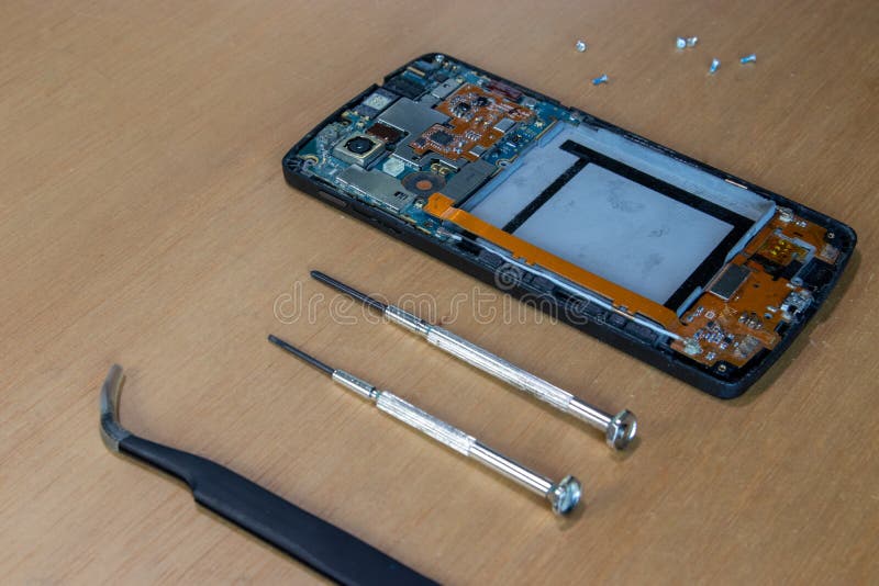 Broken Smartphone Being Repaired at Home Stock Image - Image of ...
