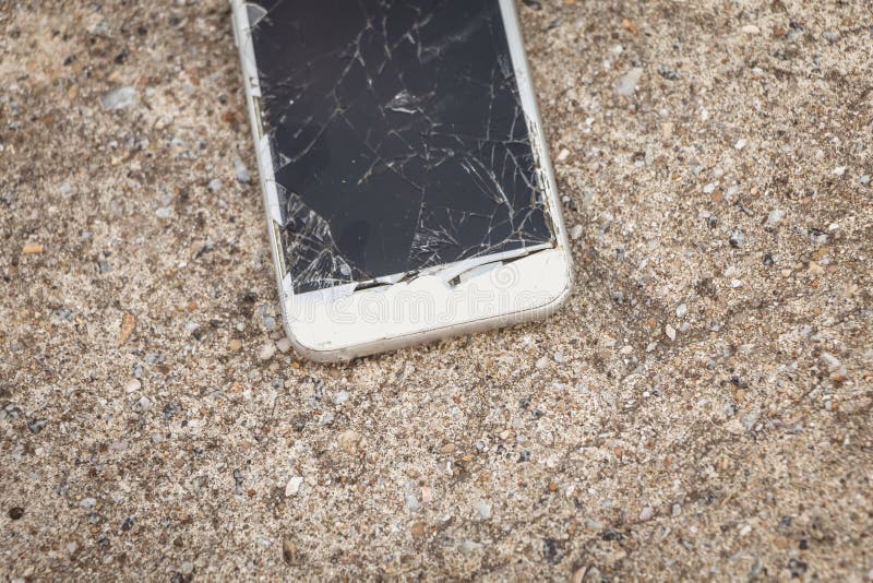 Broken Smartphone Fallen on a Concrete Floor Stock Image - Image of ...