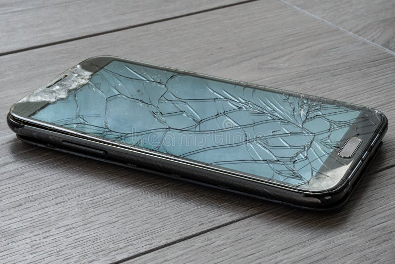 Broken Smartphone on the Floor. Stock Photo - Image of broken, floor ...