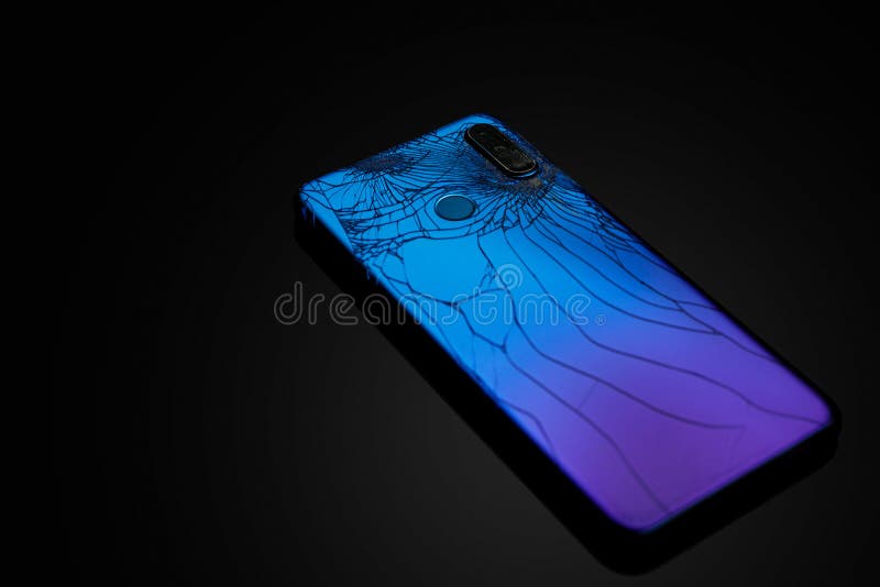 Broken Smartphone. Mobile Phone with a Broken Camera. Stock Photo ...