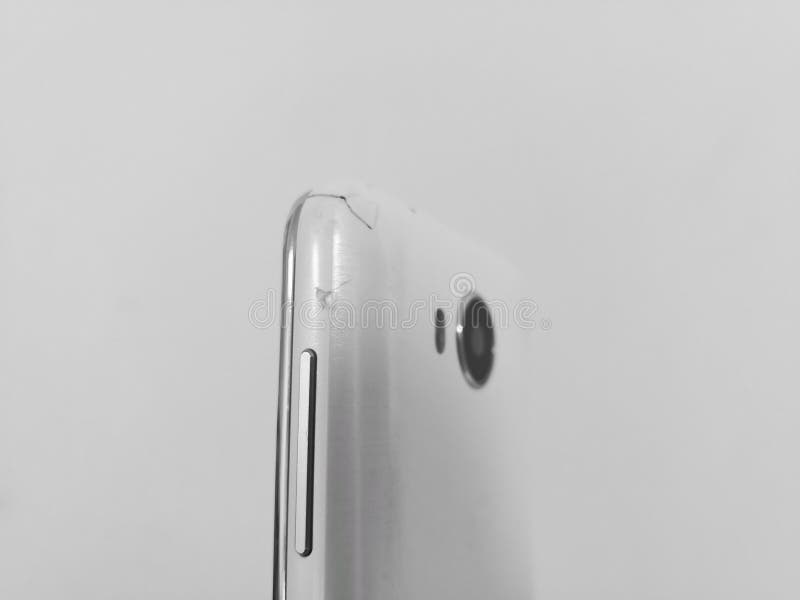 Broken Smartphone with a Slit or Crack on Top. Cell Phone Damaged after ...