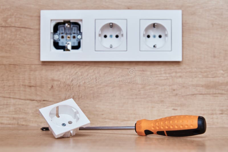 Broken Socket and Screwdriver on the Table Stock Photo - Image of ...