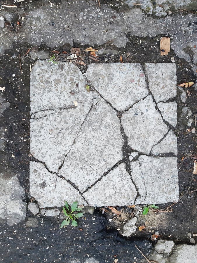 Broken Square Plate in the Street in the Yard Stock Photo - Image of ...