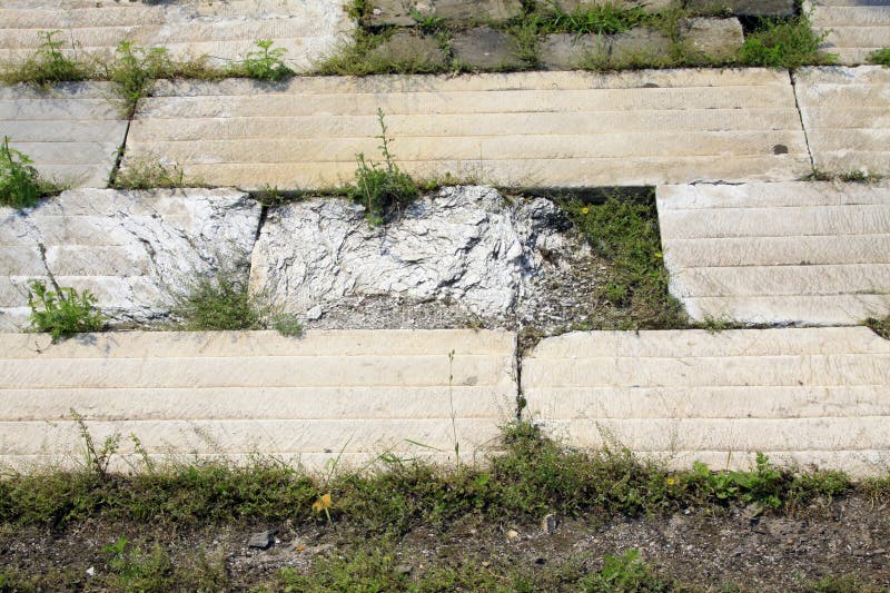 Broken stone on the ground stock image. Image of depression - 366315339