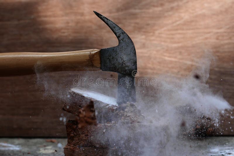 Hammer Smashing Rock