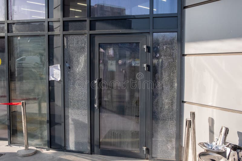 Broken Store Windows. Vandalized Stores in Almaty Editorial Stock Photo ...