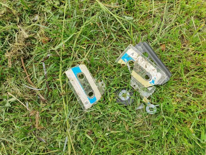 Broken Tape Cassette in the Grass Flat View Stock Photo - Image of ...