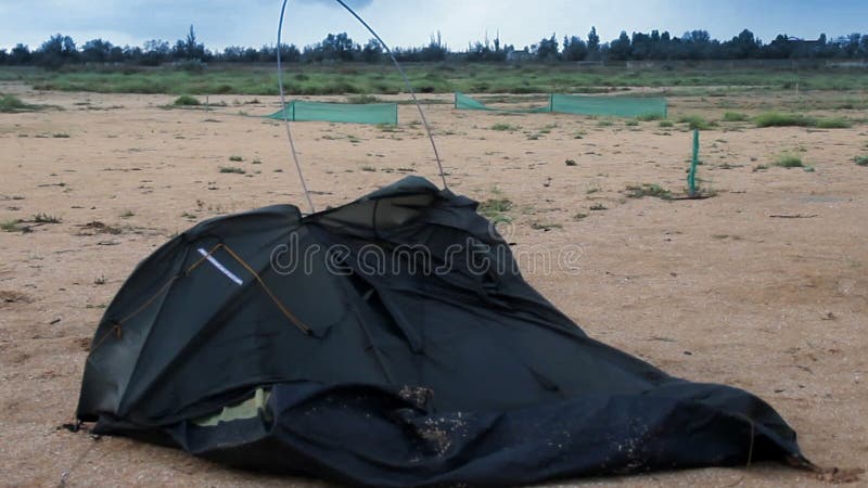 Broken tent at the beach stock footage. Video of broke - 101349400