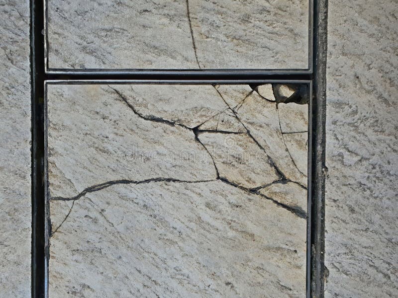 Broken tiles of a pavement stock image. Image of pavement - 315517659