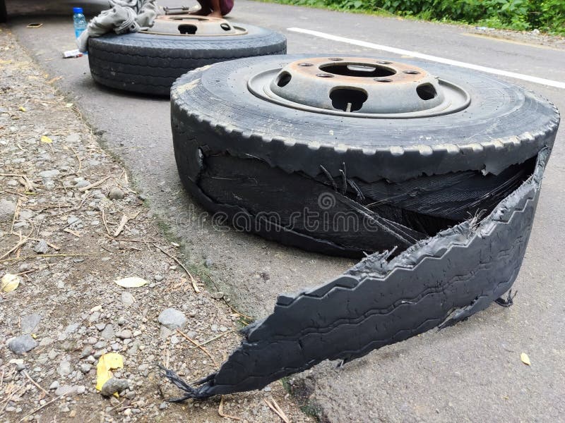 Broken tire at the street stock image. Image of street - 278048553