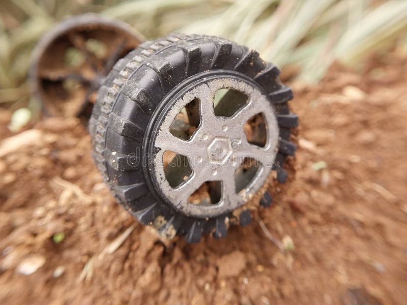 Broken Toy Car Wheel on the Ground Stock Photo - Image of wheel, ground ...