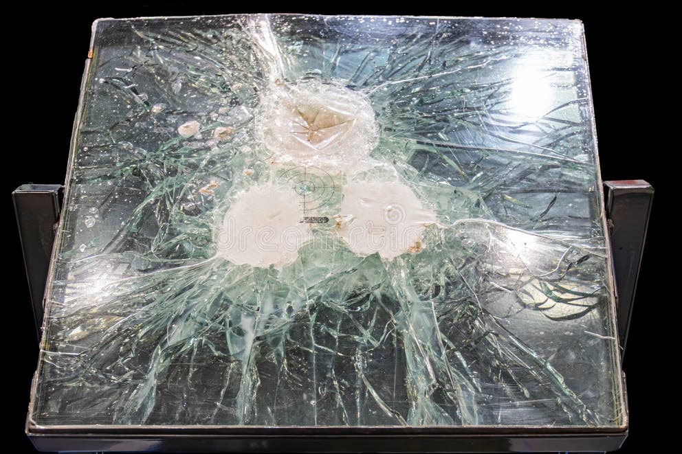 Broken Triplex Glass Table with Bullet Marks, Scattered Pieces, Metal ...