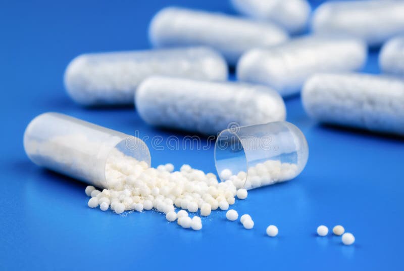 Broken up medicine capsule stock image. Image of dosage - 25773919