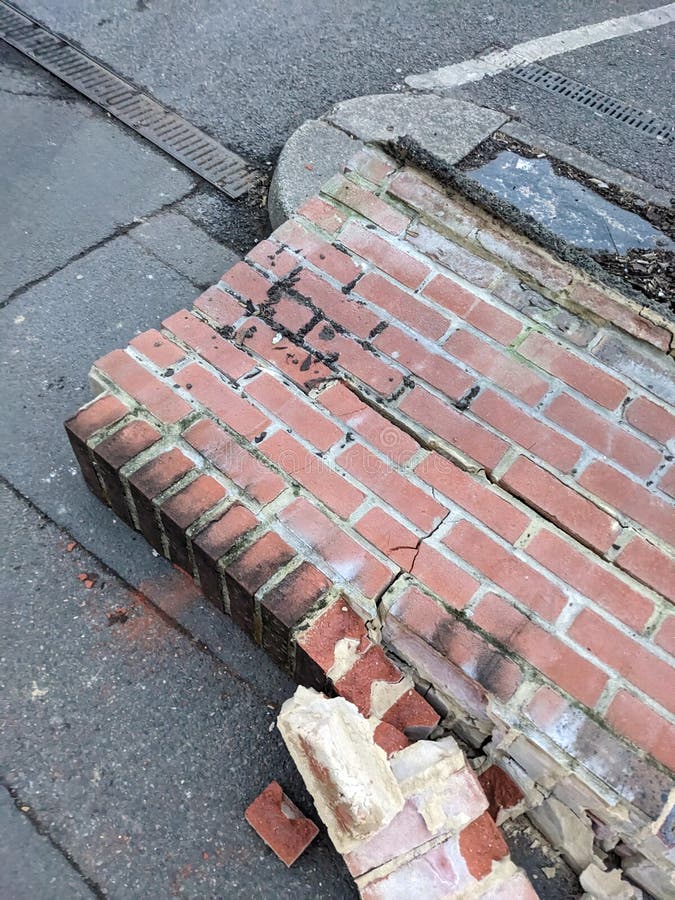 Broken Wall in a Carpark Been Hit by a Car with Warning Barrier Around ...