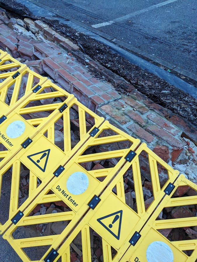 Broken Wall in a Carpark Been Hit by a Car with Warning Barrier Around ...