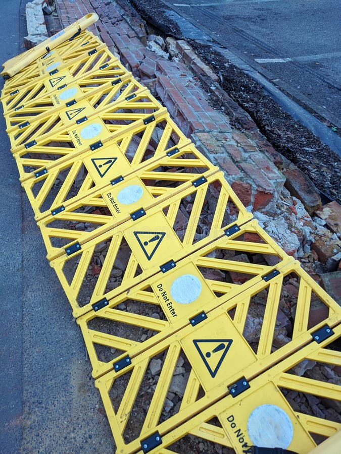 Broken Wall in a Carpark Been Hit by a Car with Warning Barrier Around ...