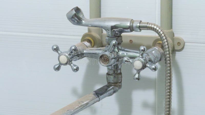 Broken Water Tap with Water Leaking from it. Stock Video - Video of ...