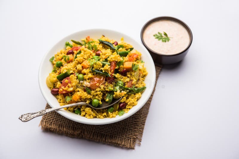Daliya Upma or Broken Wheat Upma Stock Photo - Image of eating ...